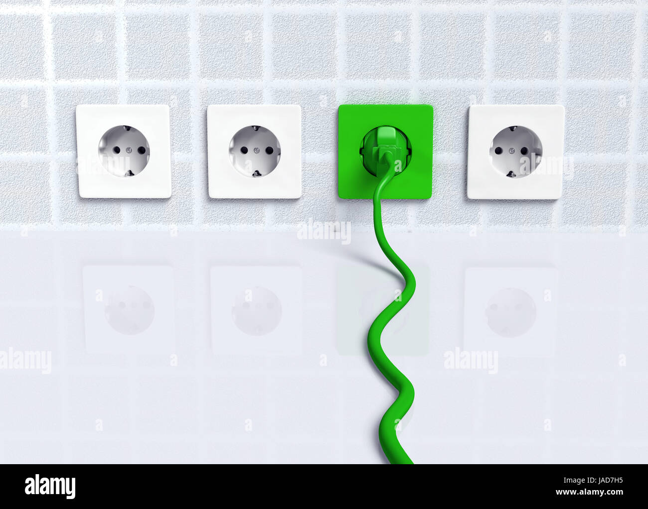 ecological green plug is connected to a green socket placed on the wall ...