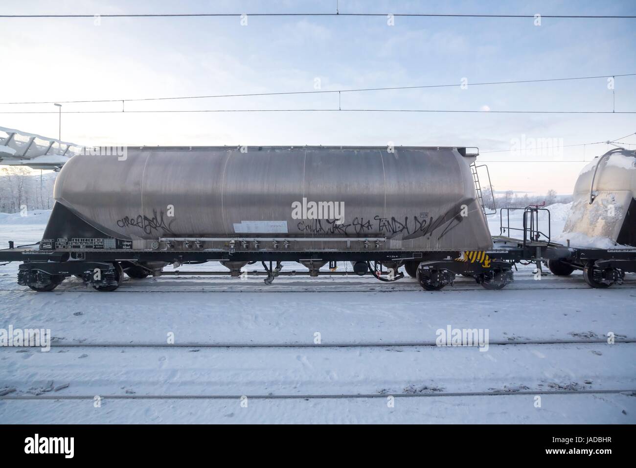 Oil tanker train freight logistic with winter landscape Stock Photo - Alamy