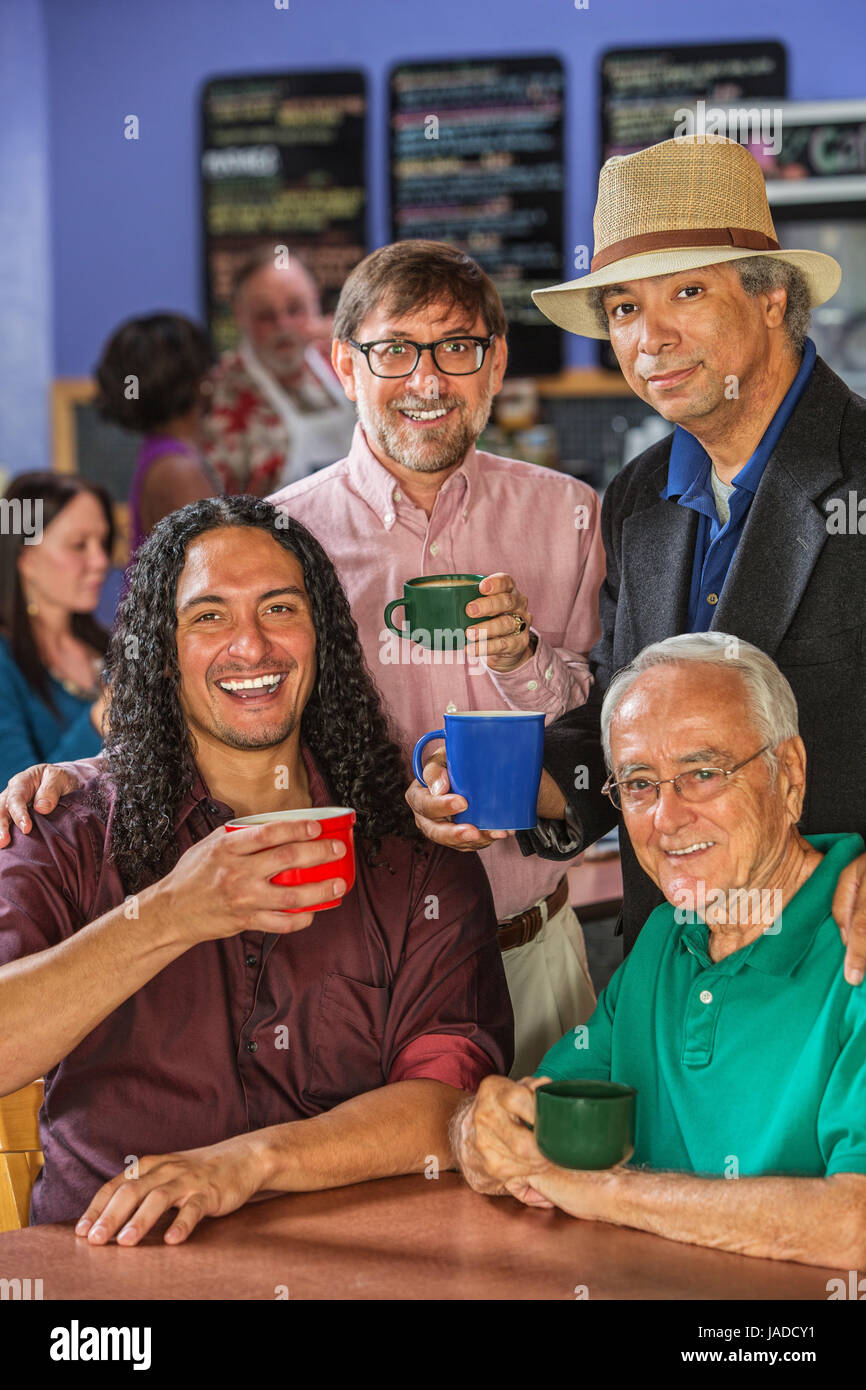Diverse group of handsome men in coffee house Stock Photo - Alamy