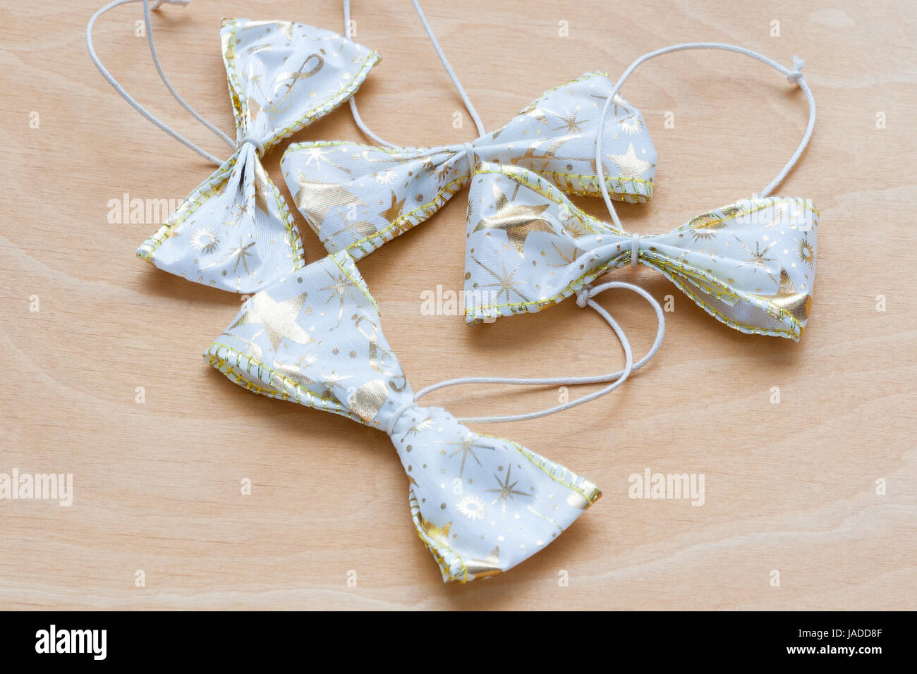bows on light wood background Stock Photo - Alamy