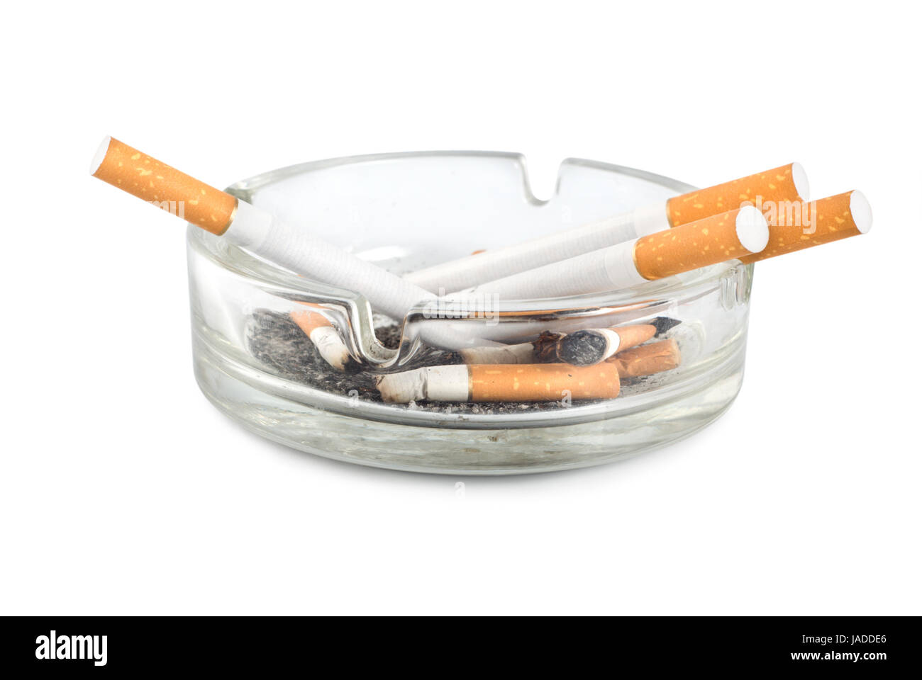 Cigarettes in an ashtray isolated on white background Stock Photo - Alamy