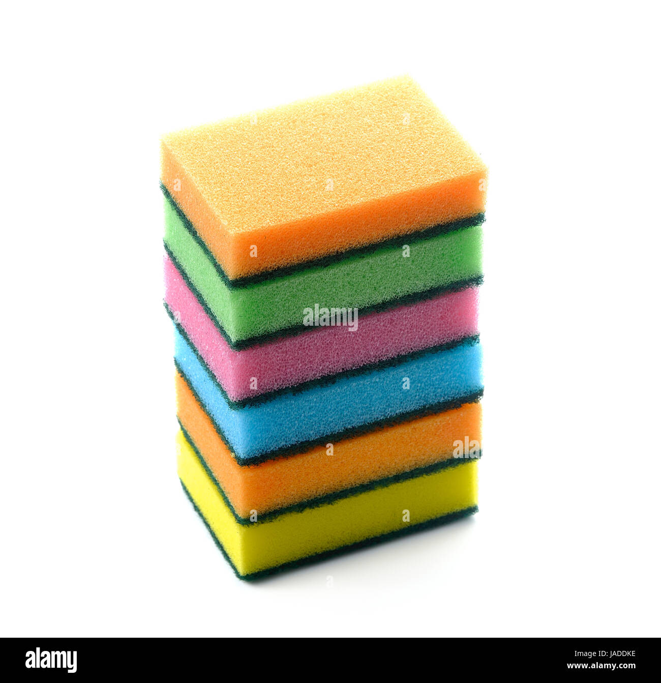 colorful household sponges for washing dishes, isolated on a white ...