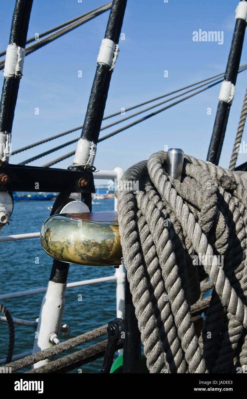 The ropes braided in bays on an ancient sailing vessel Stock Photo - Alamy