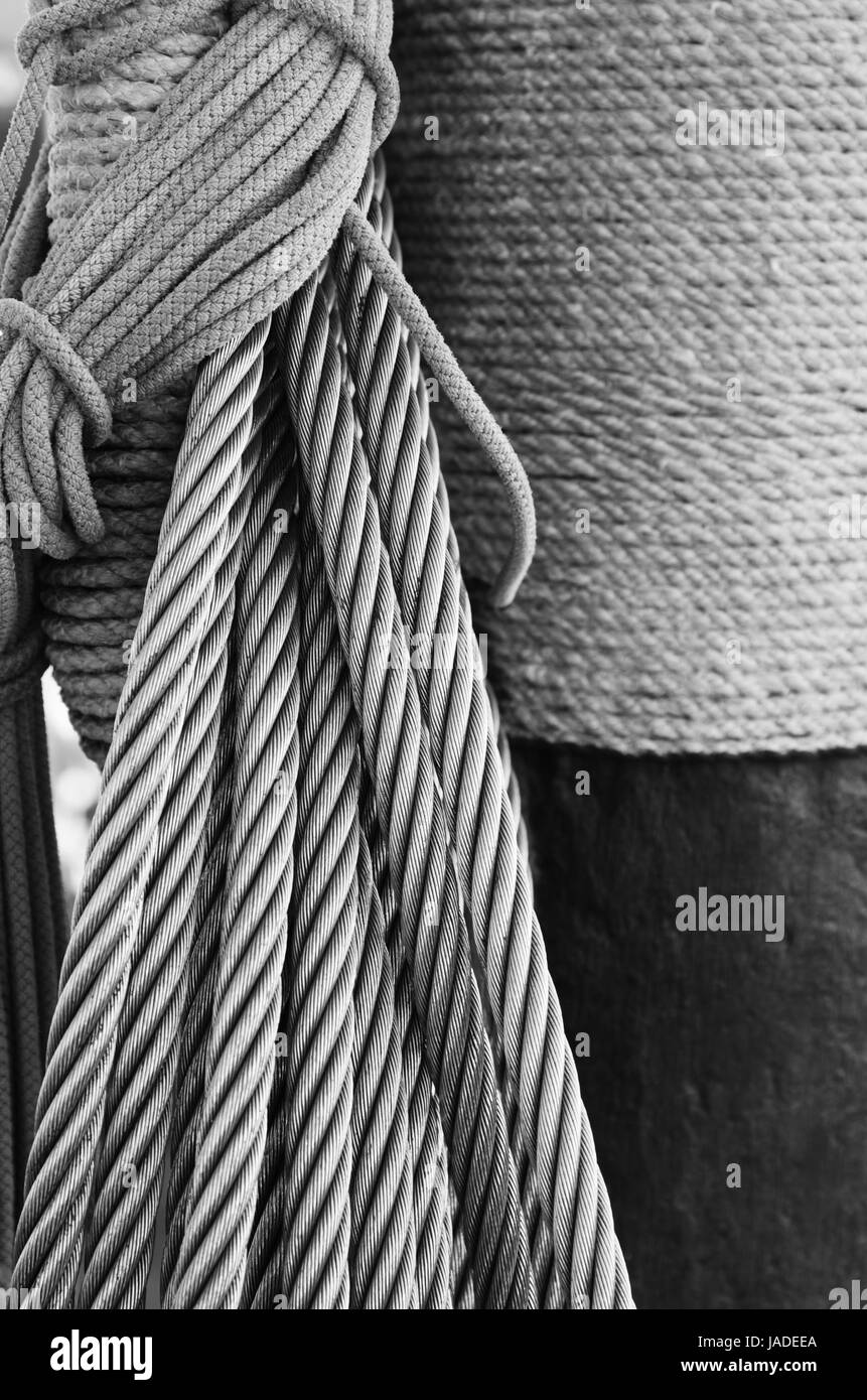 The ropes braided in bays on an ancient sailing vessel Stock Photo - Alamy