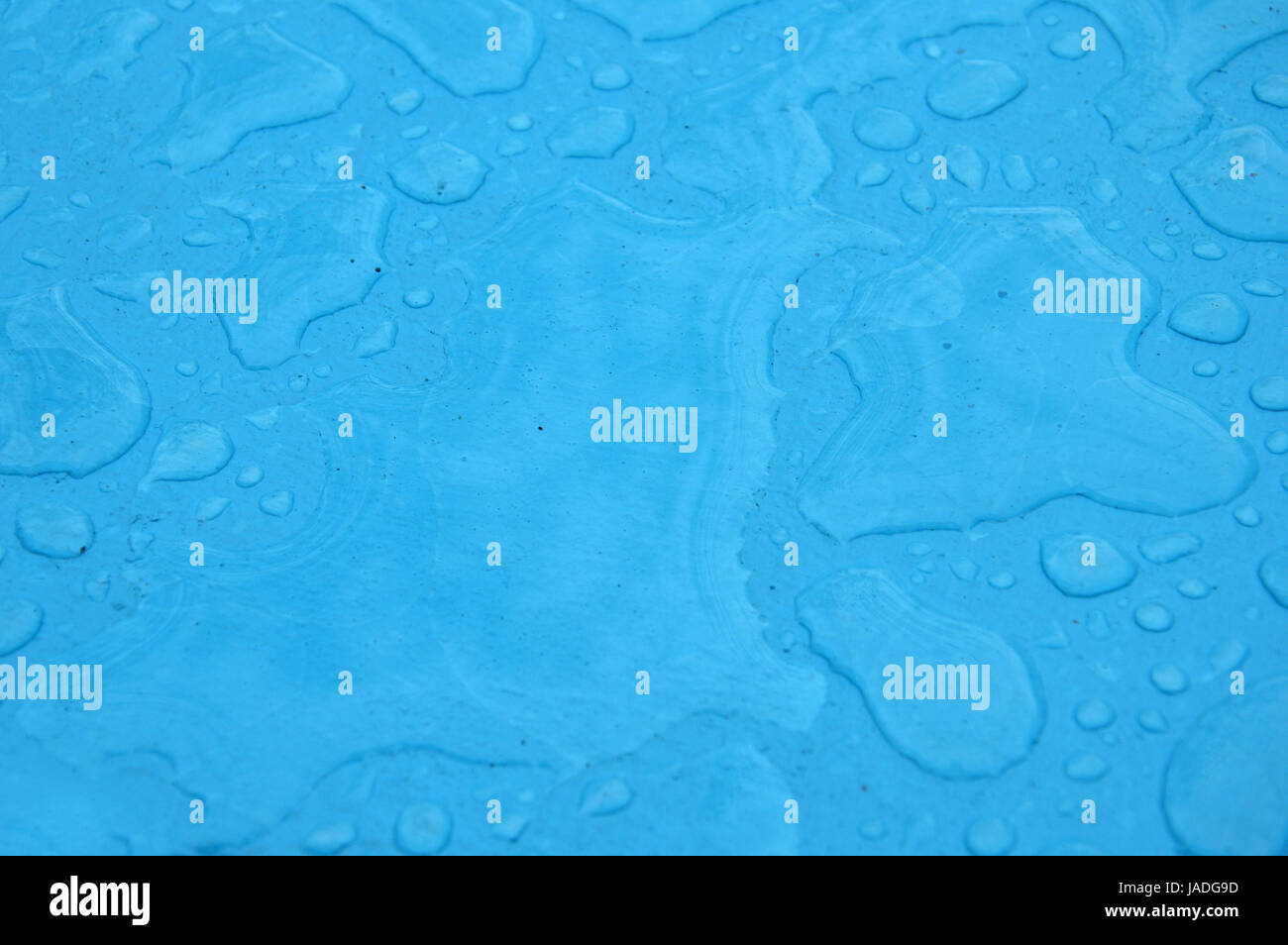 blue rain puddles Stock Photo - Alamy
