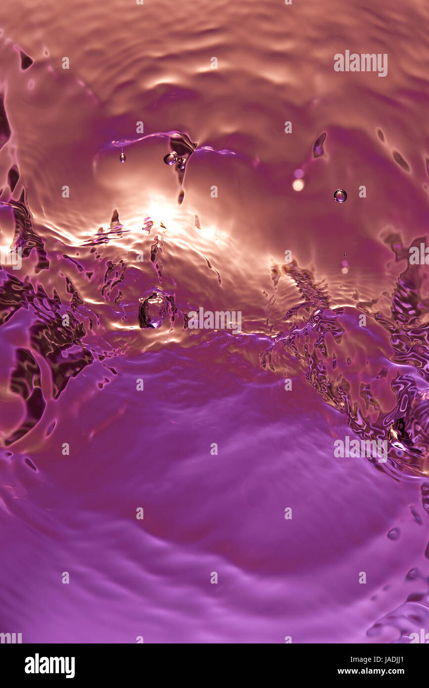 Rippled water purple background. Colorful liquid spash top view Stock ...