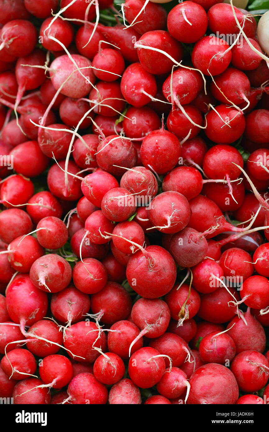 Big pile of red radish root vegetable Stock Photo - Alamy