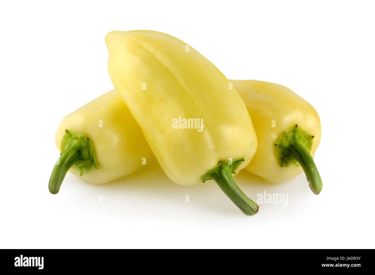 Three yellow bell pepper isolated on white background Stock Photo - Alamy