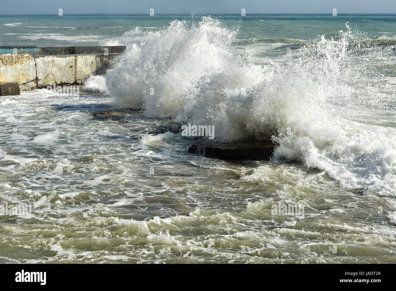 Waves of the Caspian Sea are fighting on the rocky shore Stock Photo ...