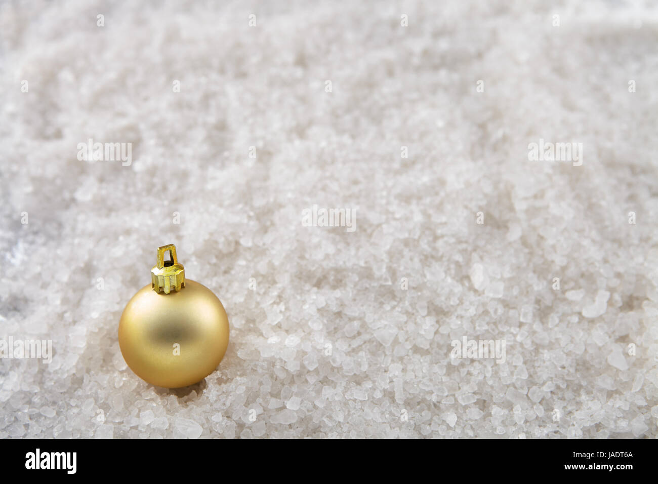 A single Christmas ball on a snow background with top down angle Stock ...