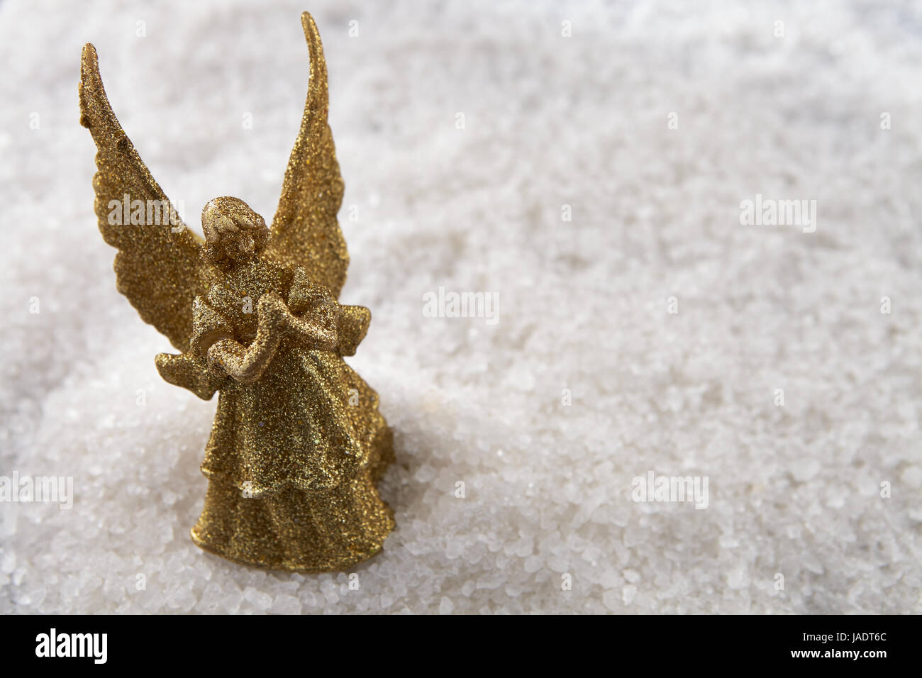 A single Christmas angel on a snow background with top down angle Stock ...