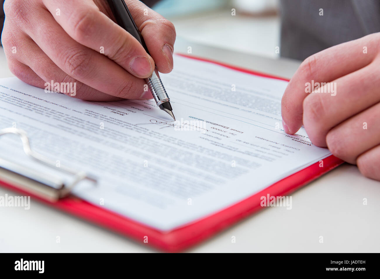 Businessman taking notes at the meeting Stock Photo - Alamy
