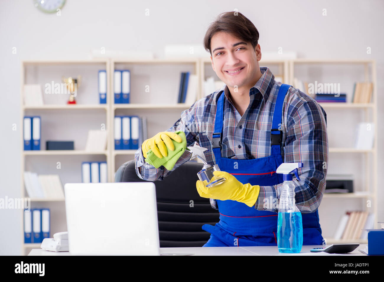 Office cleaner working in the office Stock Photo - Alamy