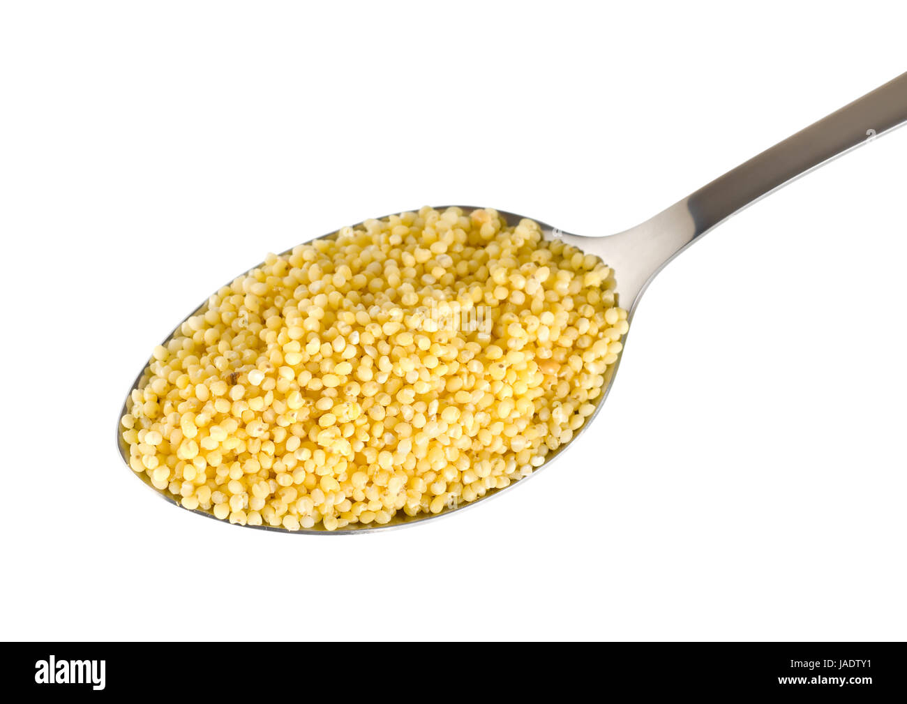 Millet in a spoon isolated on white background Stock Photo - Alamy