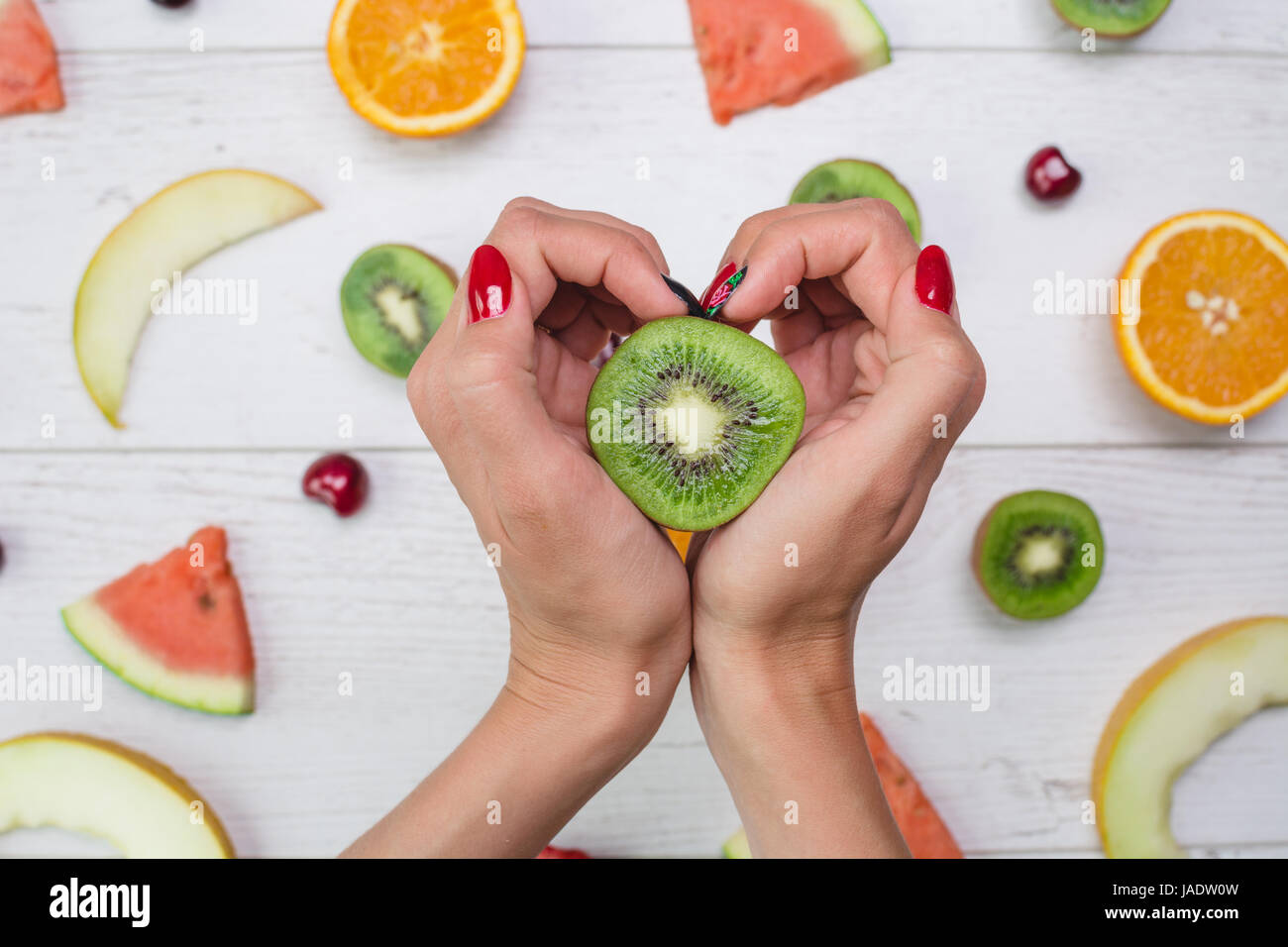 Top view of girl's hands, placed on white desktop with fruits Stock ...