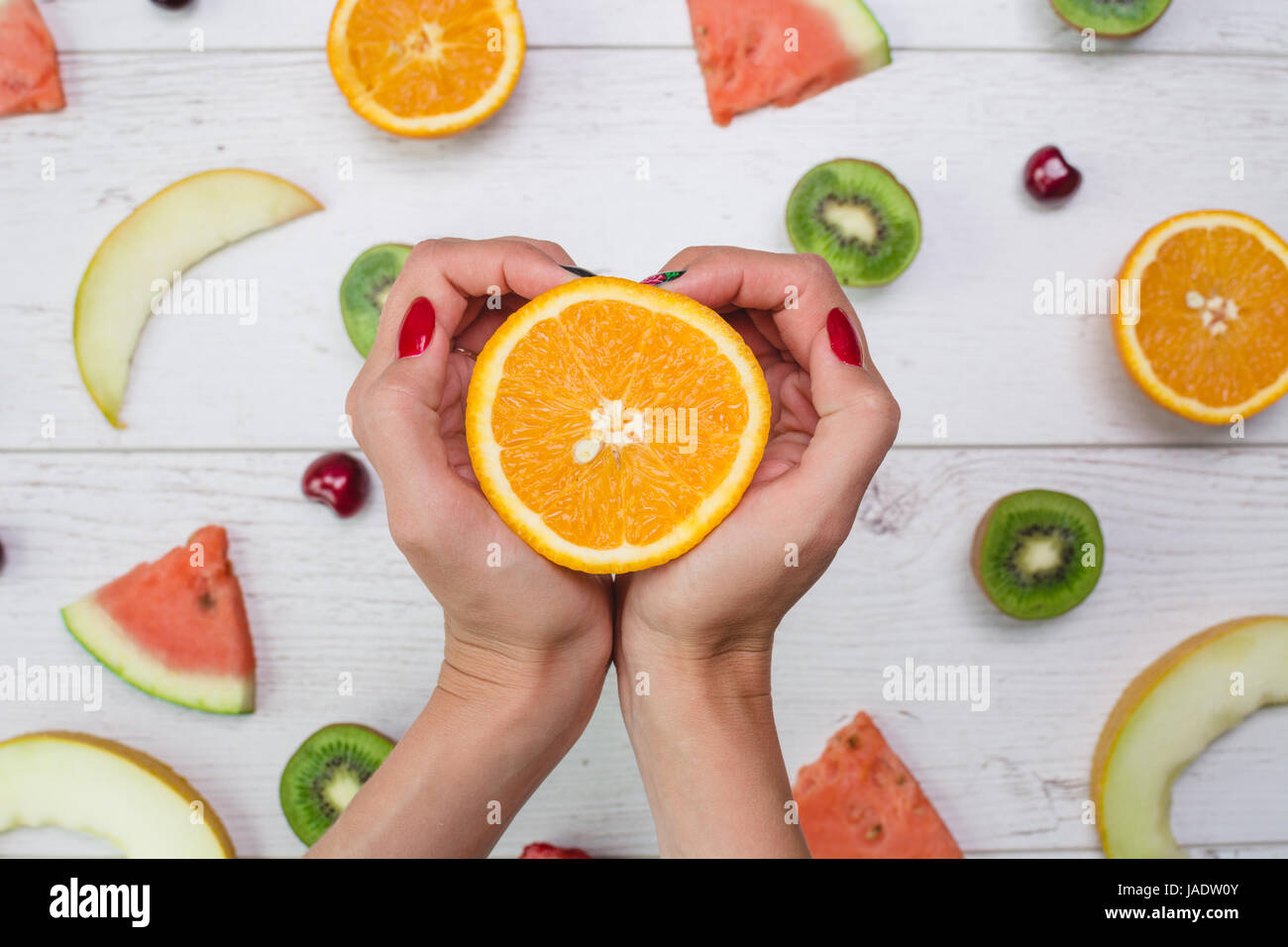 Top view of girl's hands, placed on white desktop with fruits Stock ...