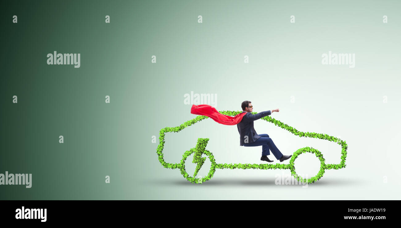 Electric car concept in green environment concept Stock Photo - Alamy