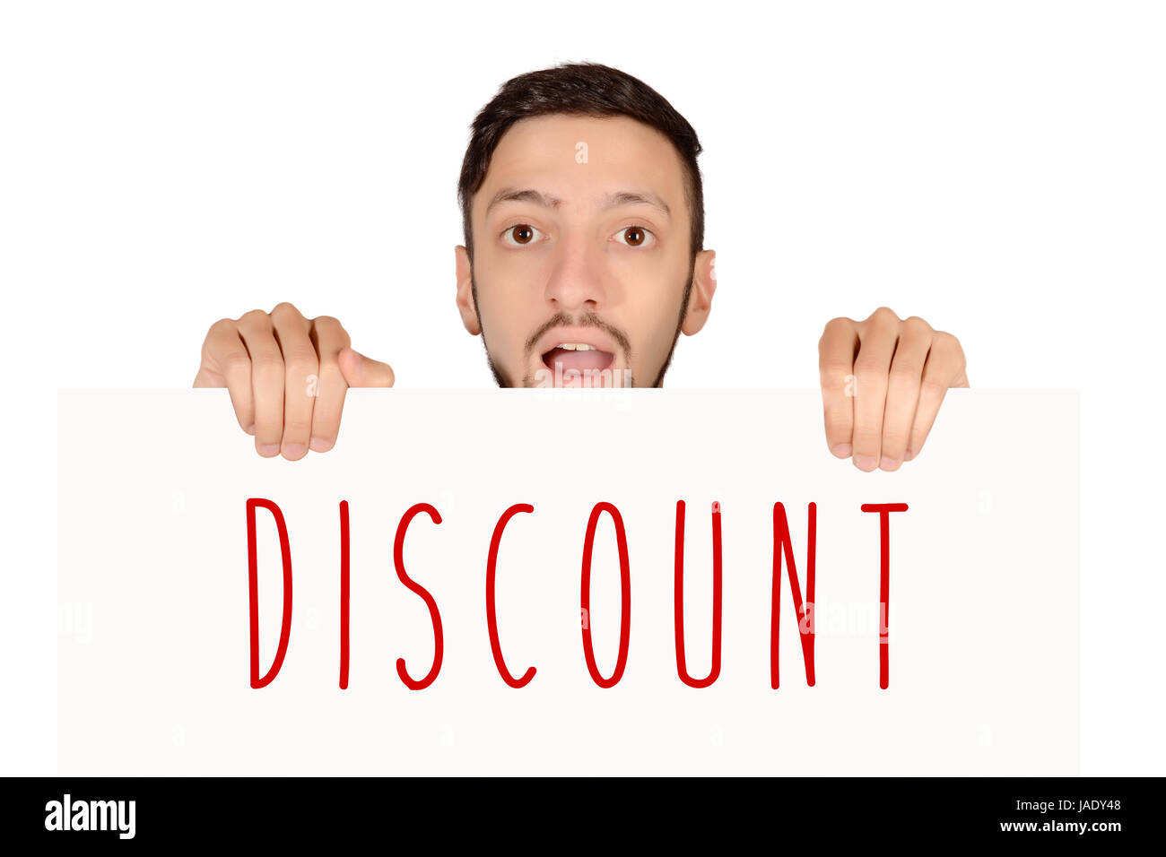 Portrait of young man holding a sign. Sale and discount concept ...
