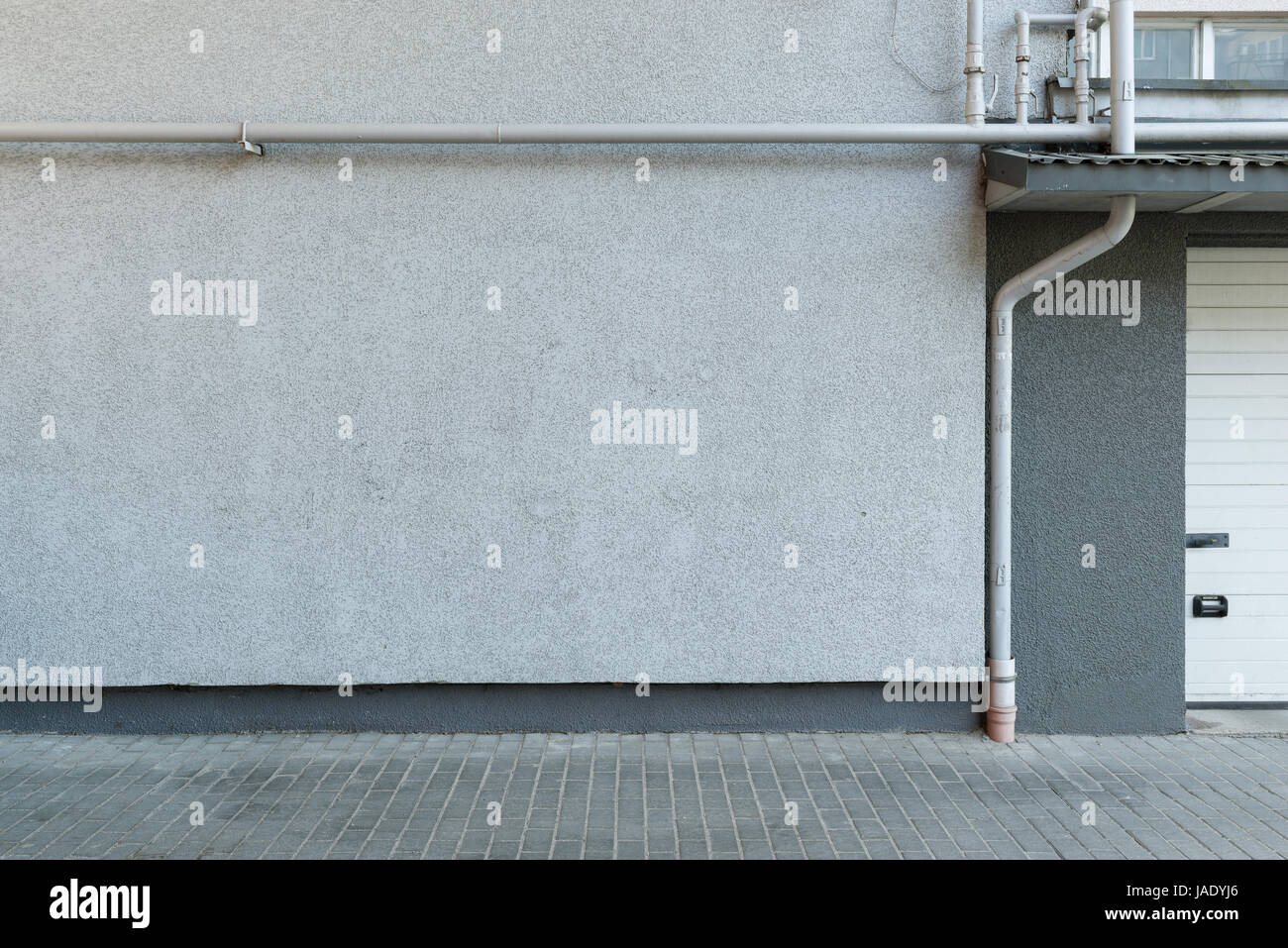 Urban background. Street wall and pavement Stock Photo - Alamy