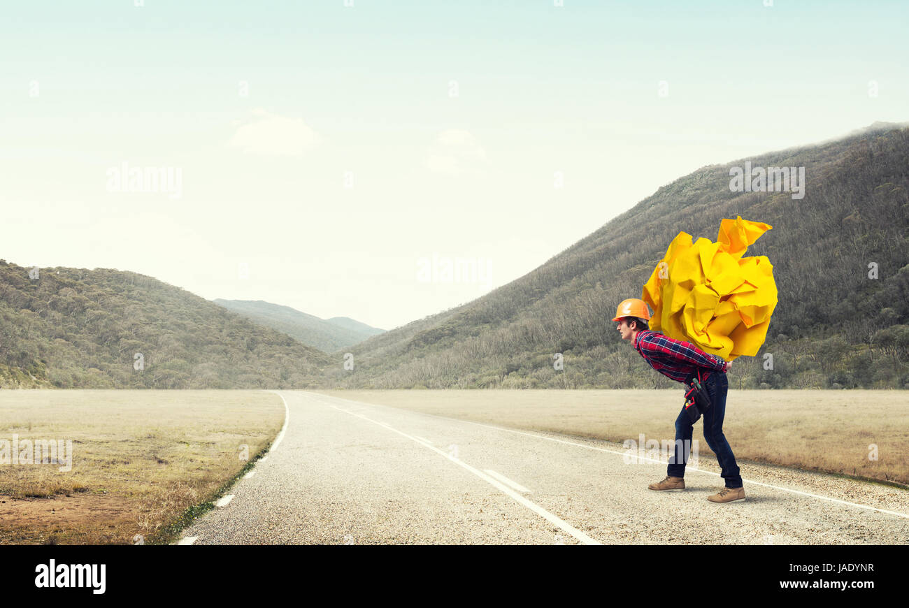 Engineer man carry load Stock Photo - Alamy