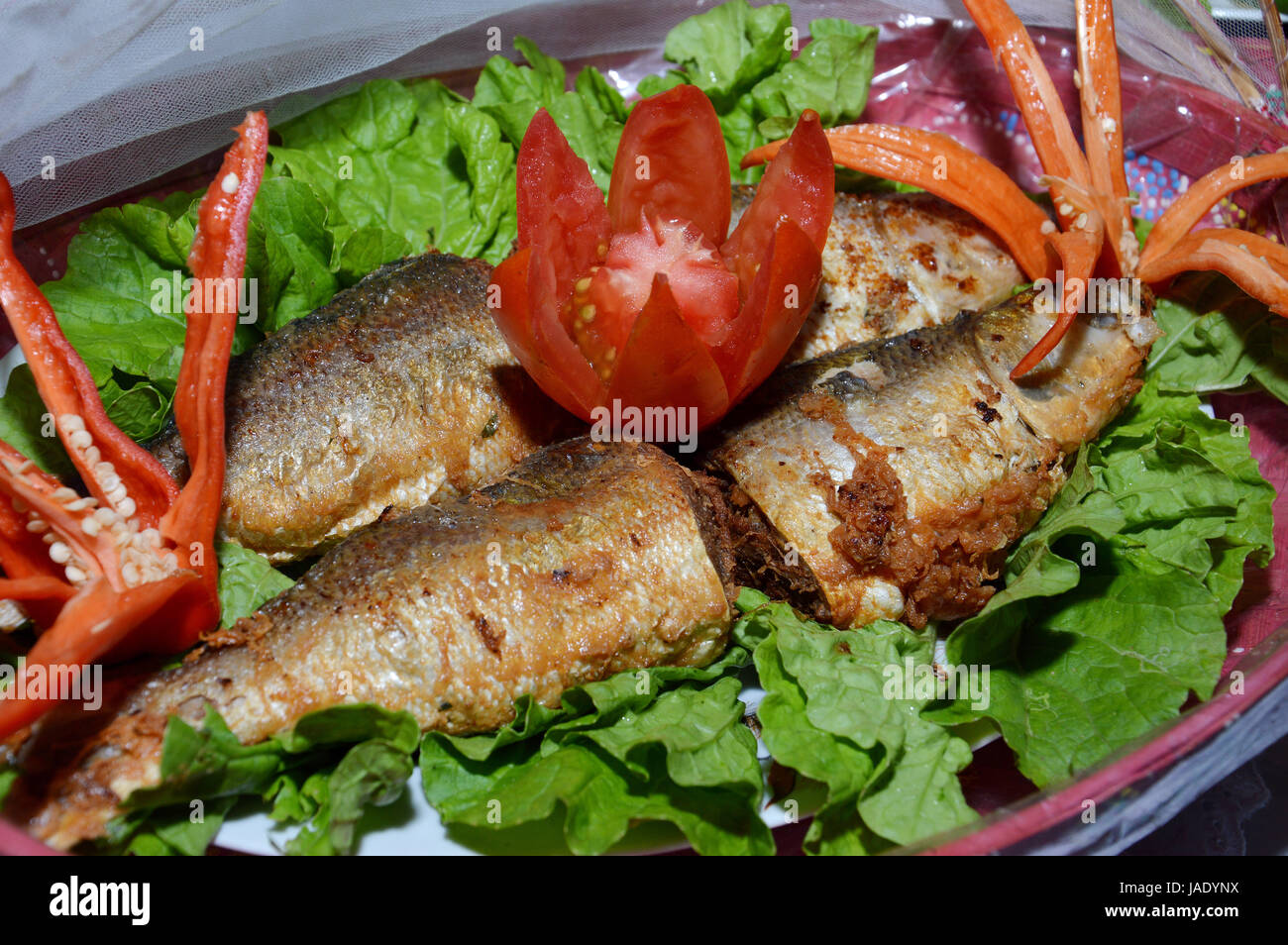 milkfish fry in the present white rice and fresh vegetables Stock Photo ...