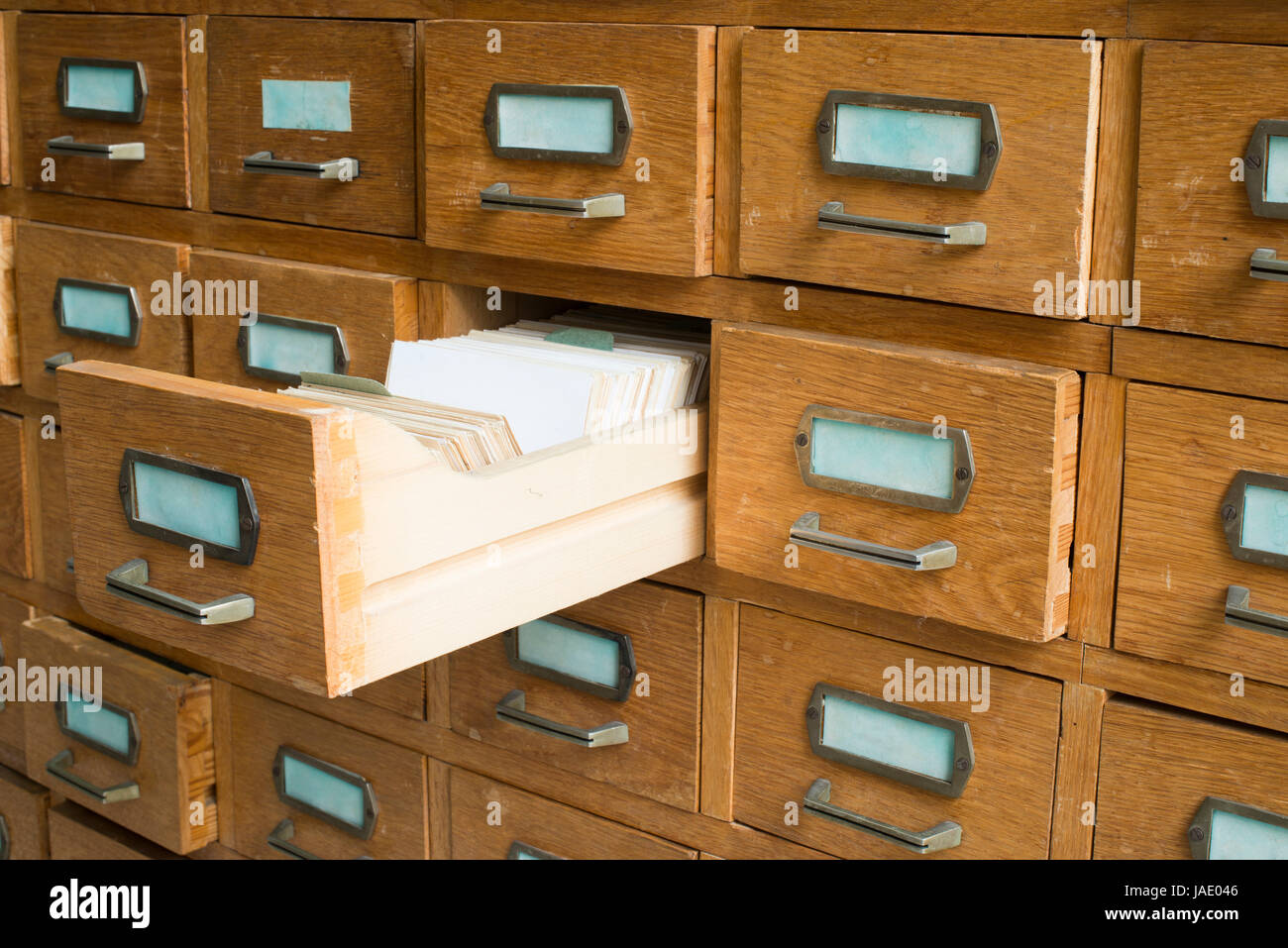 Old archive with wooden drawers Stock Photo - Alamy