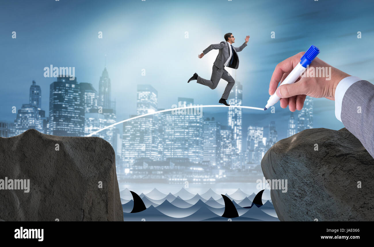 Hand drawing bridge under businessman Stock Photo - Alamy