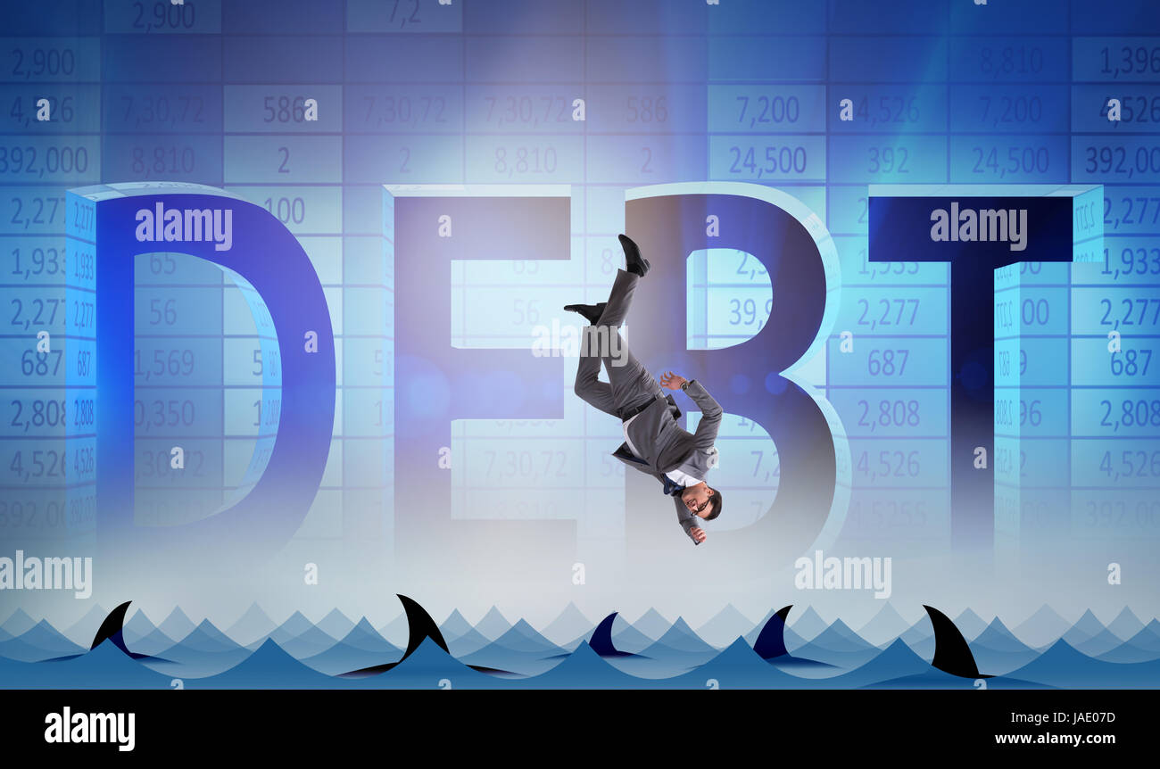 Businessman falling into sea with sharks Stock Photo - Alamy