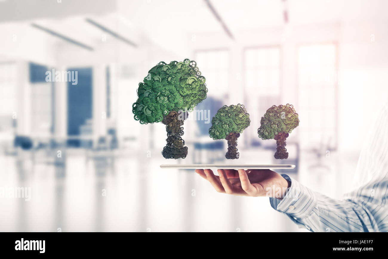 Eco green environment concept presented by tree as working mecha Stock ...