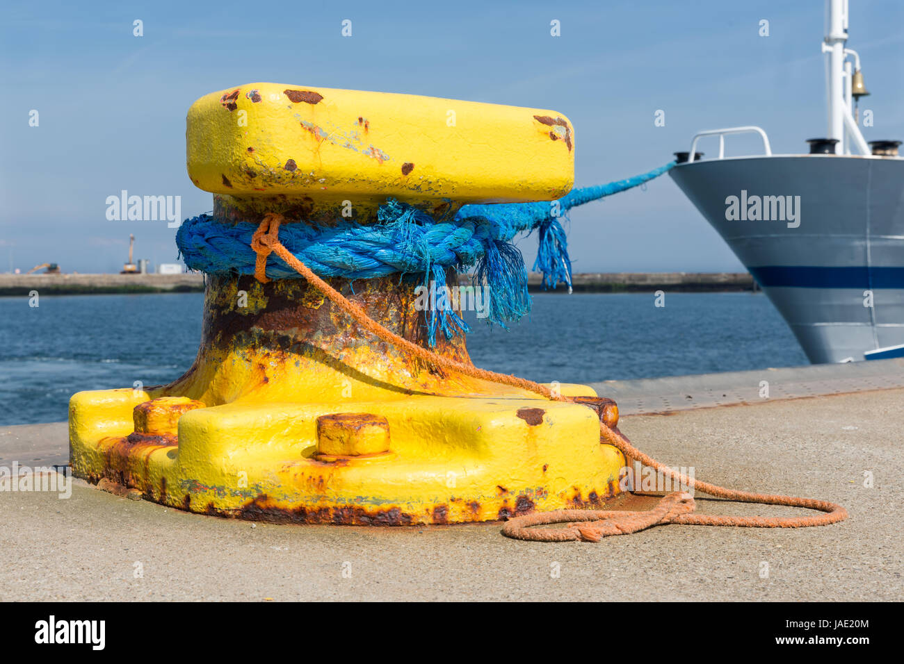 Bollard with moored ship at German Helgoland island Stock Photo - Alamy