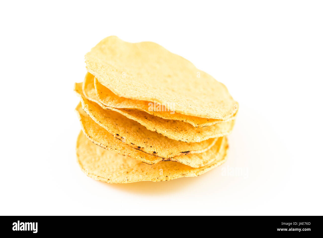 Homemade tostada shells on a white background Stock Photo - Alamy