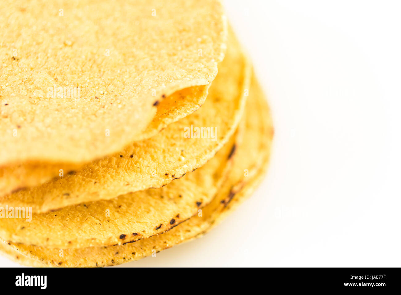 Homemade tostada shells on a white background Stock Photo - Alamy