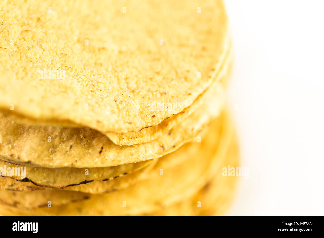 Homemade tostada shells on a white background Stock Photo - Alamy
