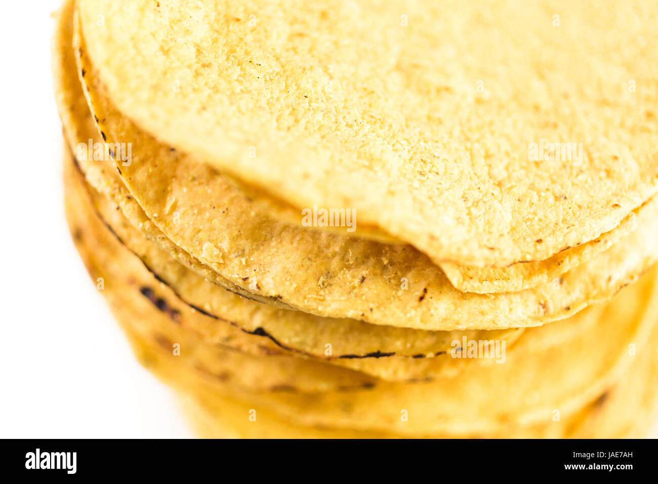 Homemade tostada shells on a white background Stock Photo - Alamy