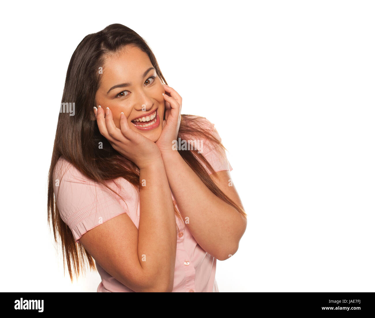 Happy young woman expressing surprise with a large smile isolated on a ...