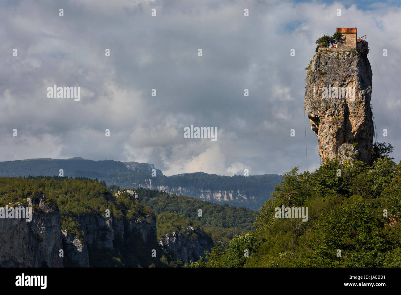 Monolithic rock formation known as Katskhi Pillar with a monk's cell on ...