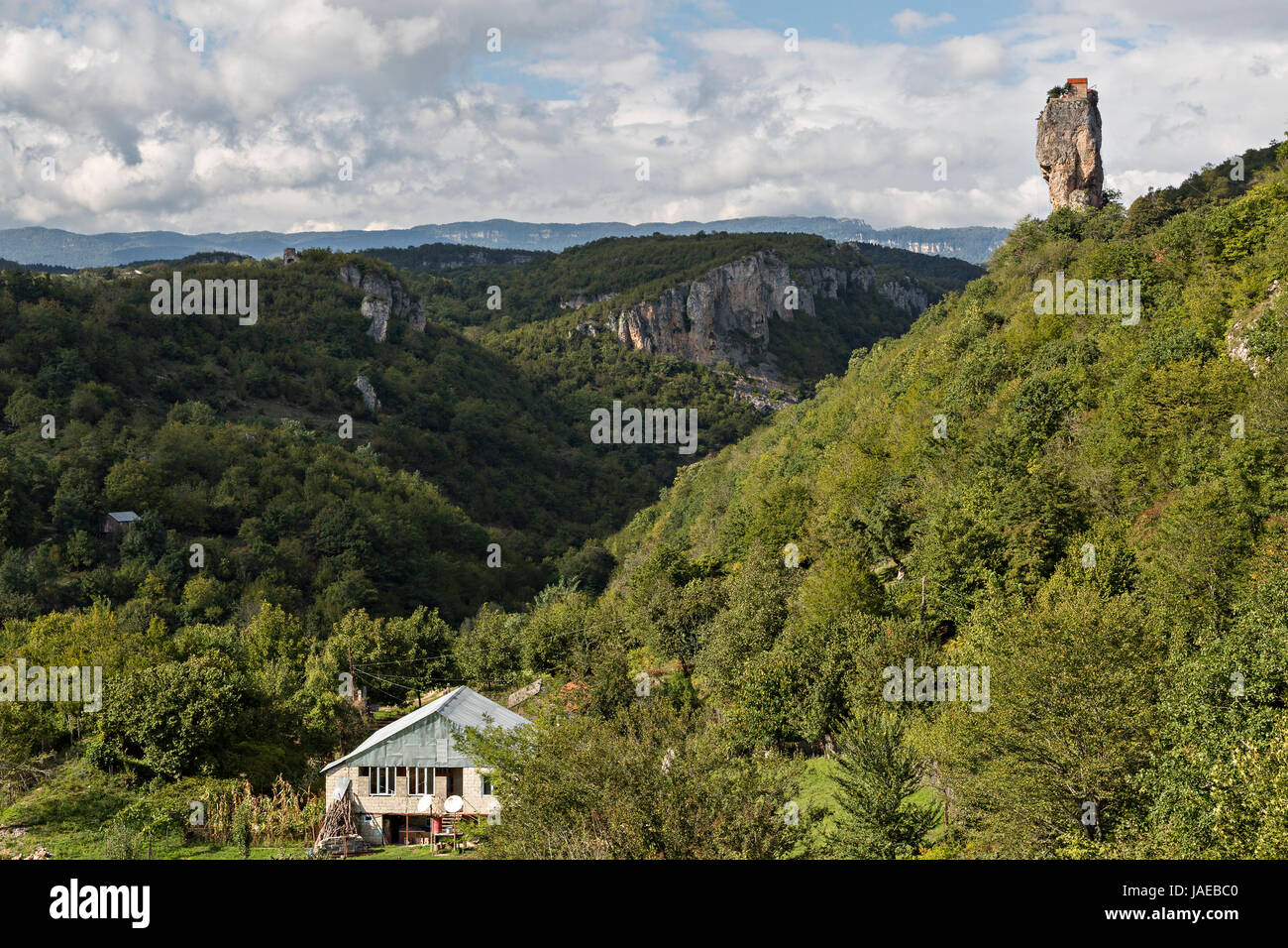Monolithic rock formation known as Katskhi Pillar with a monk's cell on ...