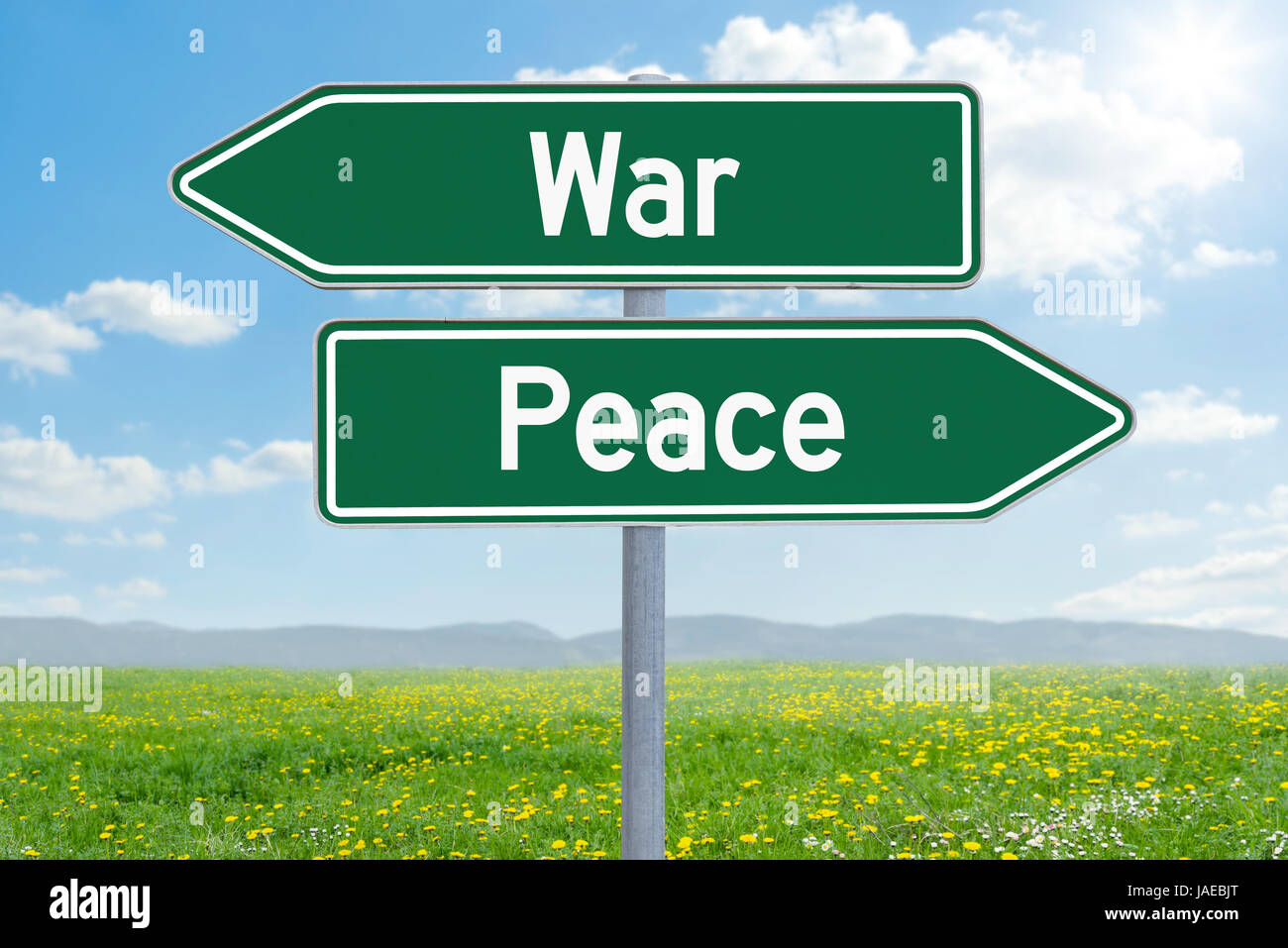 Two green direction signs - War or Peace Stock Photo - Alamy