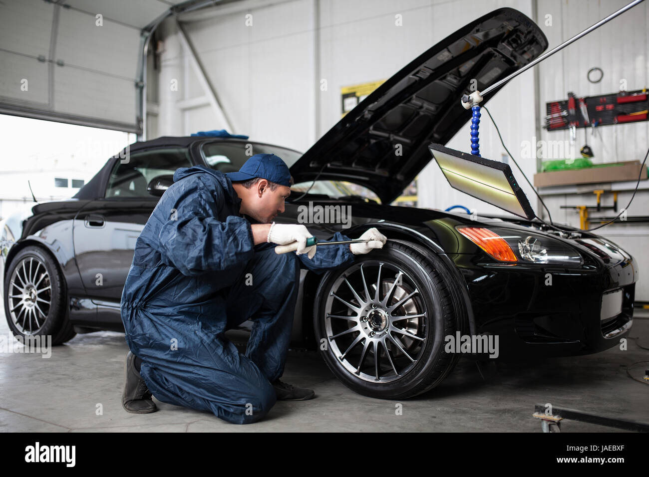 Fixing a car dent hi-res stock photography and images - Alamy