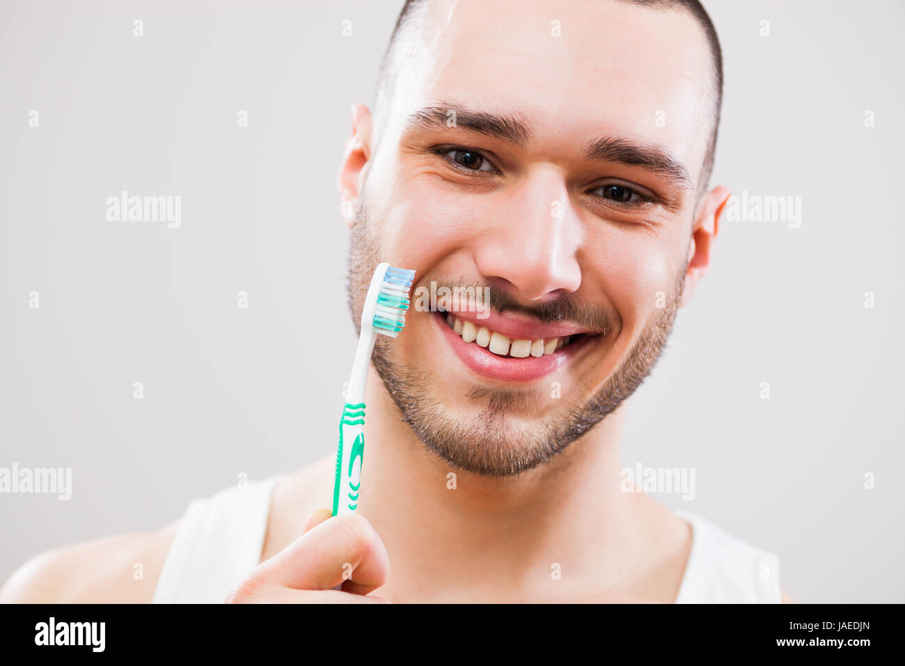 Brushing teeth black man hi-res stock photography and images - Alamy
