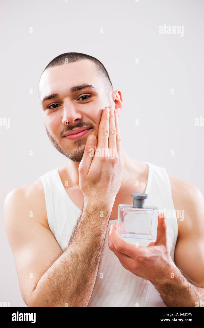 Handsome black man applying face hi-res stock photography and images ...