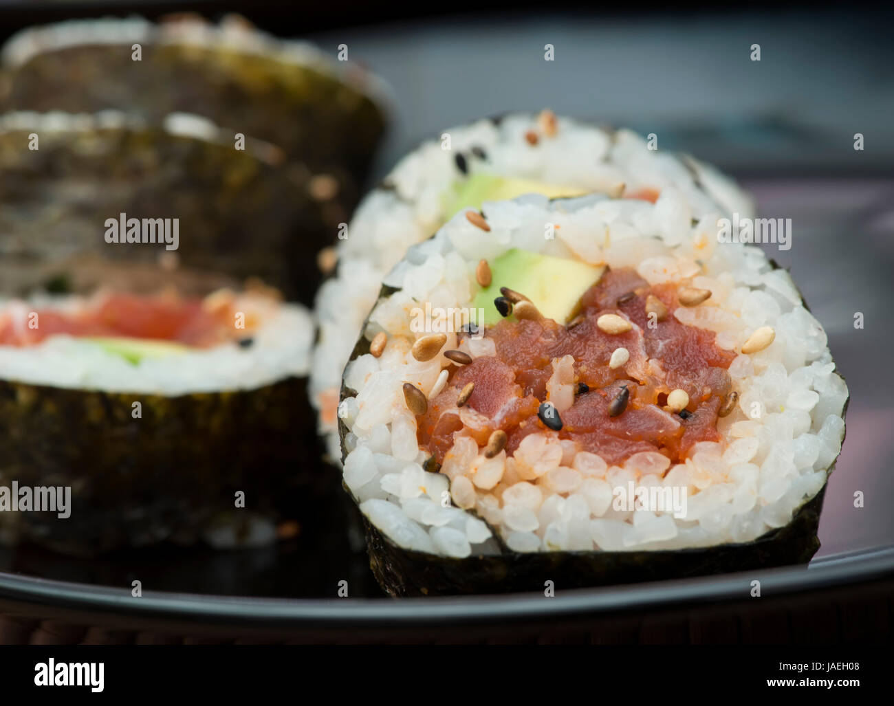 Sushi in sushi bar. Table and ration sushi Stock Photo - Alamy