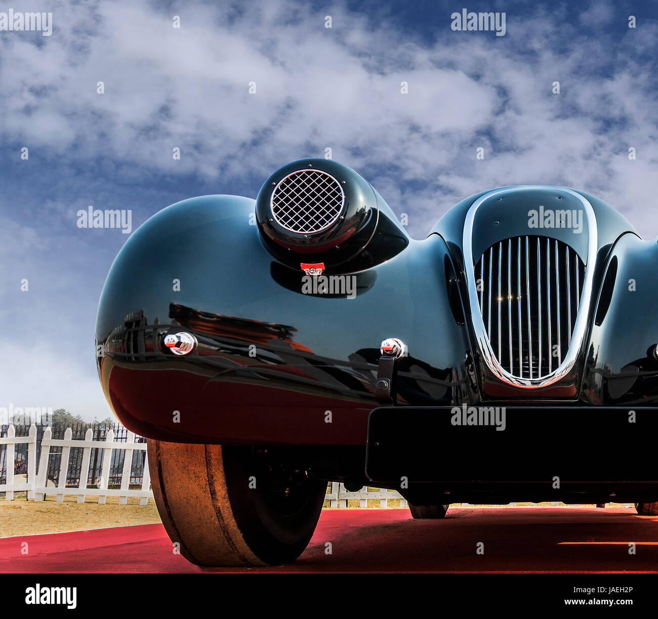Front low angle view of an unknown old-timer retro vintage sports car ...