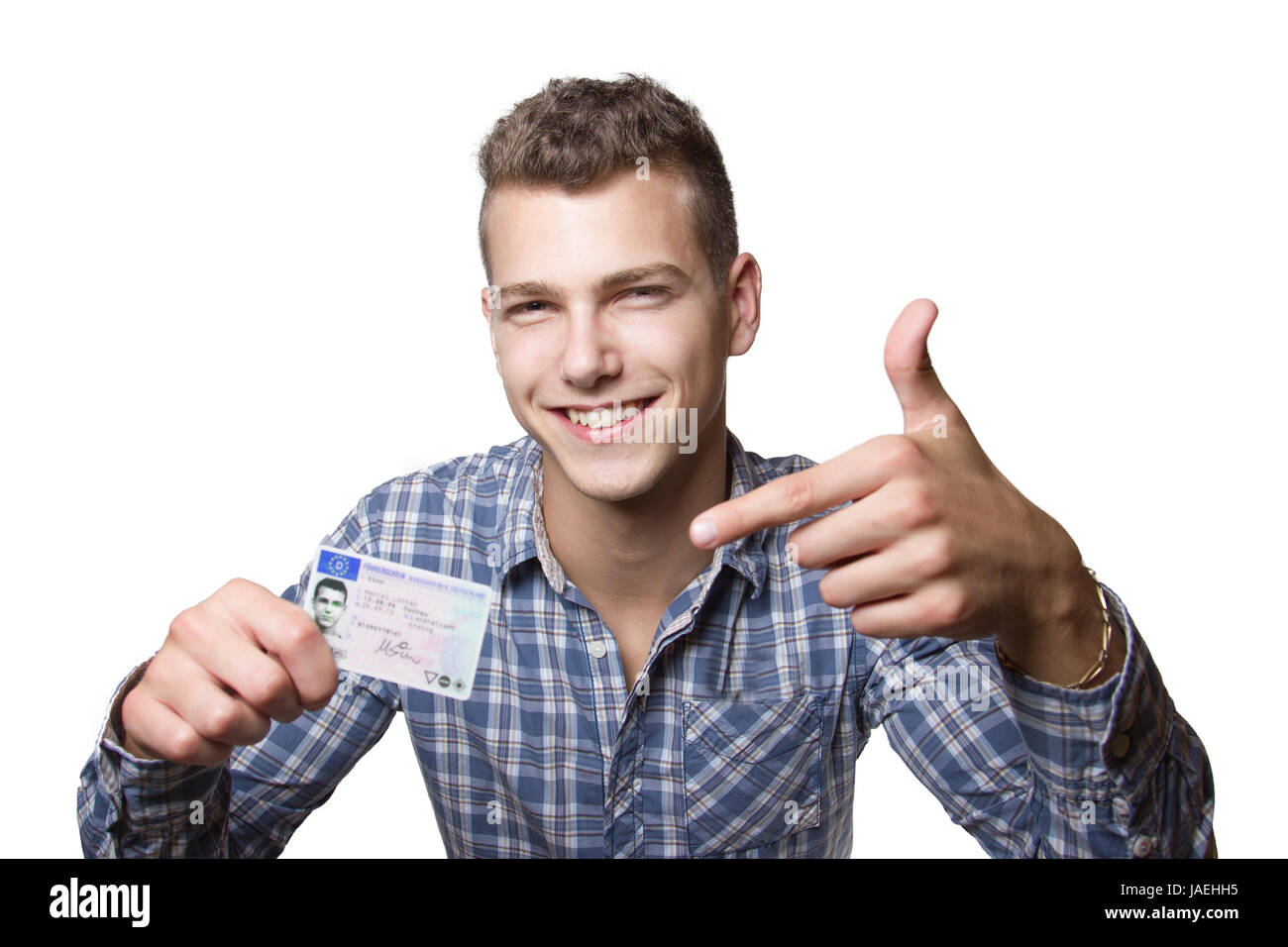 Young man just recieved his drivers license and is happy to drive his ...
