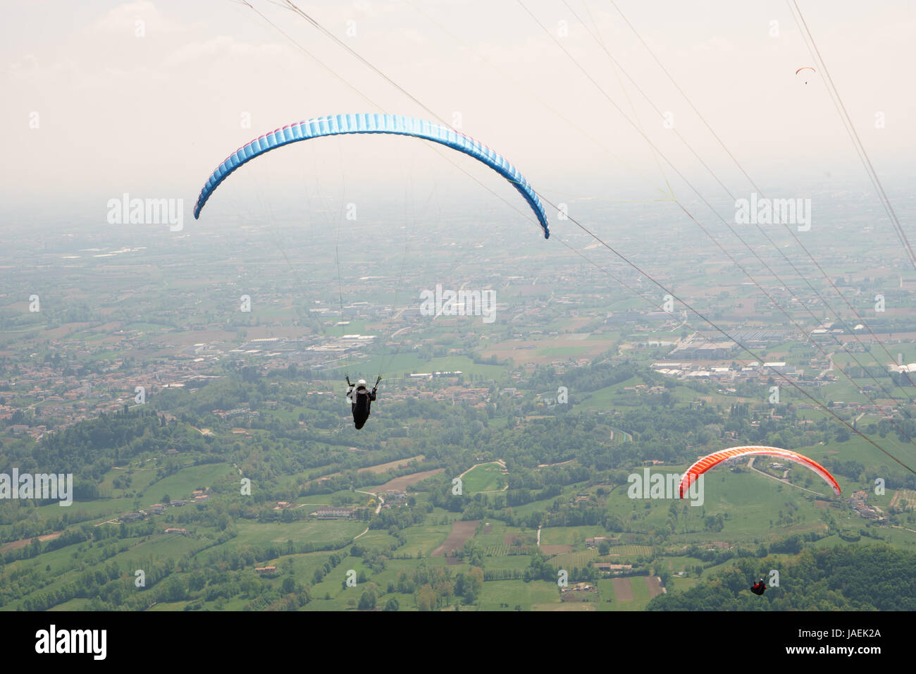 Paragliders taking off from mountain Stock Photo - Alamy