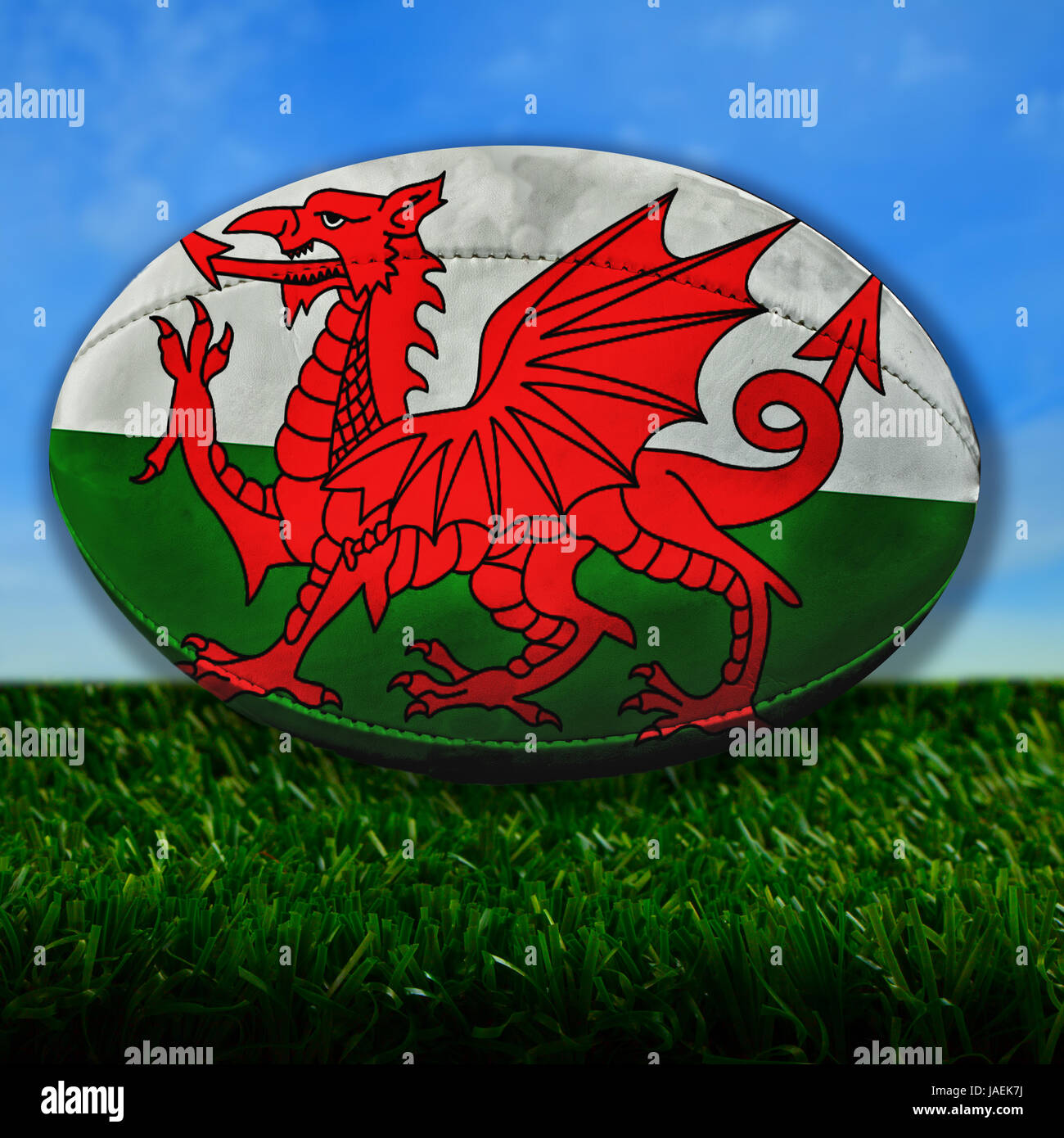 Rugby ball with Wales flag over grass Stock Photo - Alamy