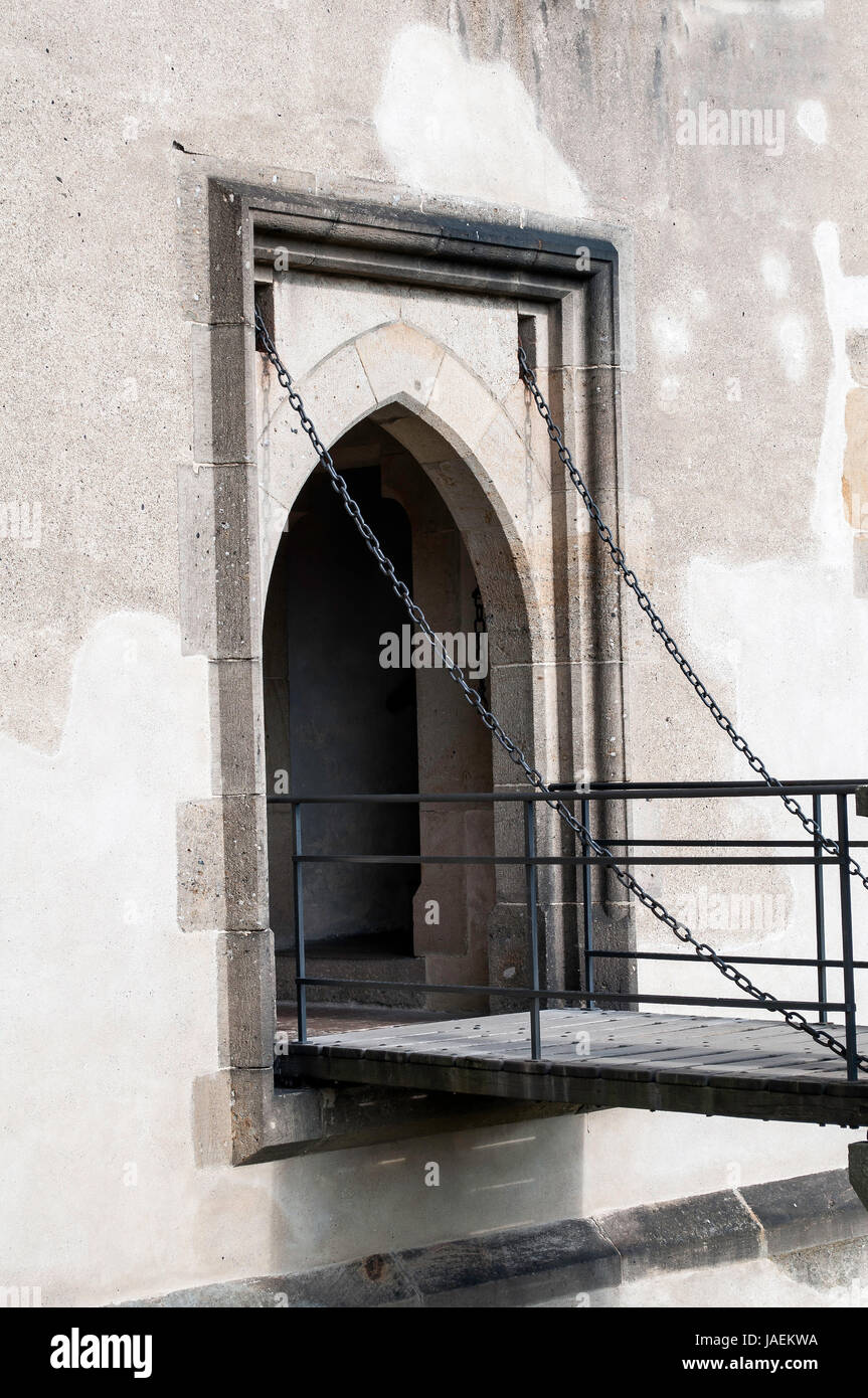 Chain driven gothic door at medieval castle in Europe Stock Photo - Alamy