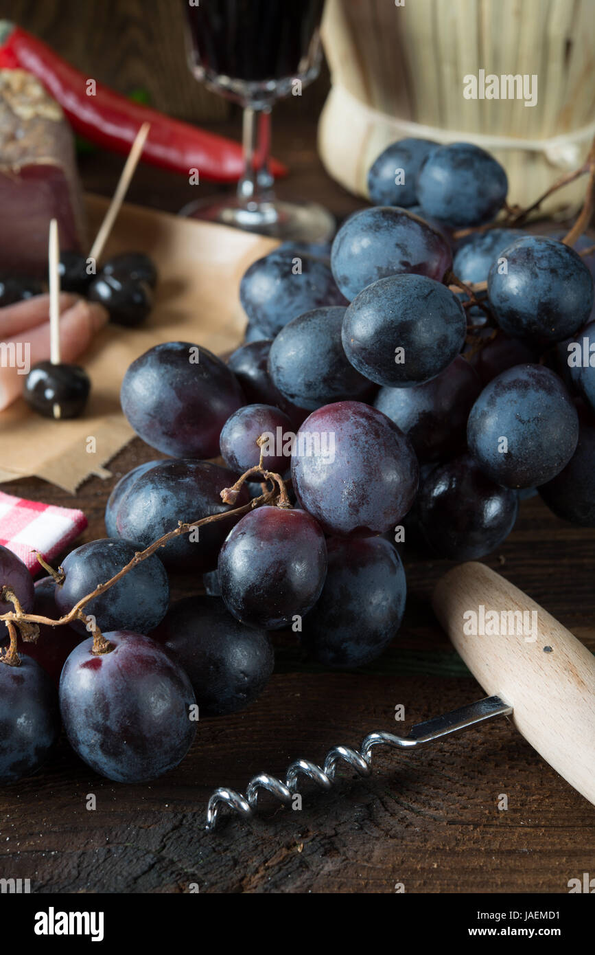 ham to olive bunches of grapes Stock Photo - Alamy