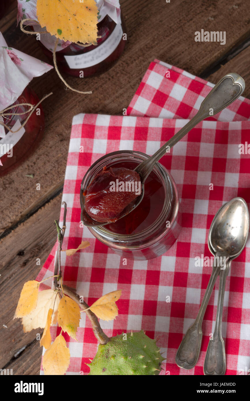 pickled Plum in red wine Stock Photo - Alamy