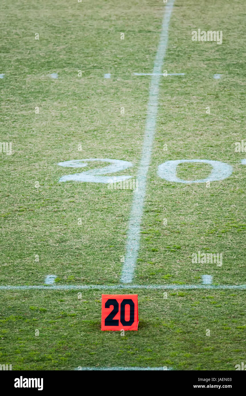 football field 20 twenty yard line marker Stock Photo - Alamy